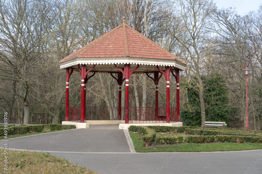 Beautiful big bandstand in a public park in the UK with the trees in ...
