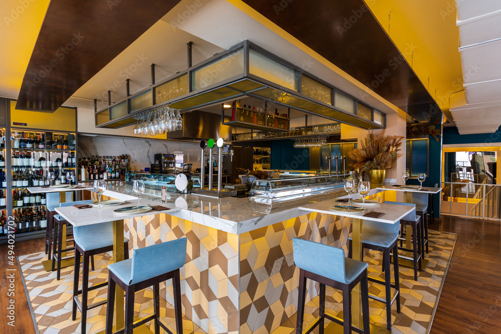 Bar counter with served tables in restaurant Stock Photo | Adobe Stock