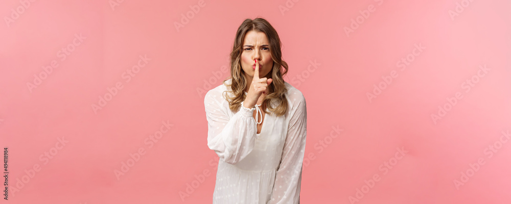 Beauty, fashion and women concept. Angry serious-looking blond girl in ...