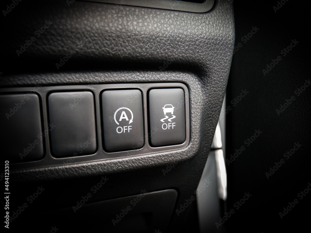 Auto Start and Stop Button and Traction Control Button in a Car Stock ...