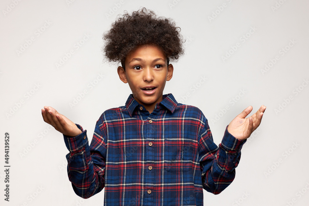 Zdjęcie Stock: Portrait of puzzled and confused African American boy in ...