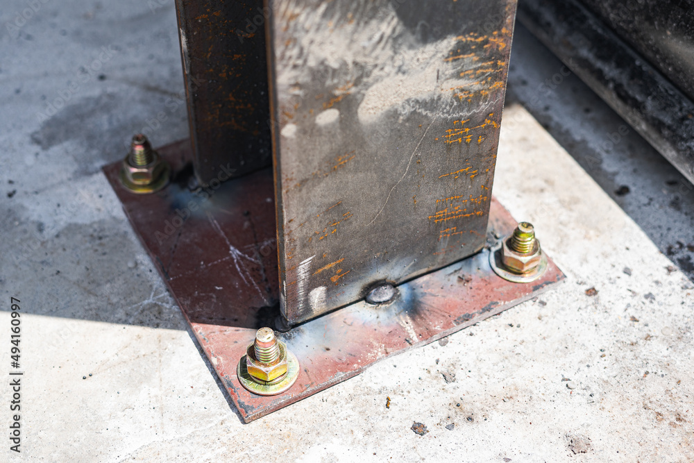 Install the steel column structure and place the base on the steel ...