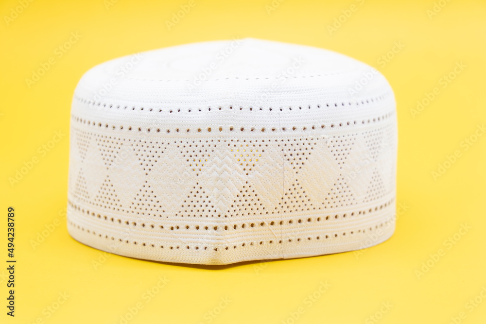 white skull-cap usually worn by Muslim men, its a symbol of muslim ...