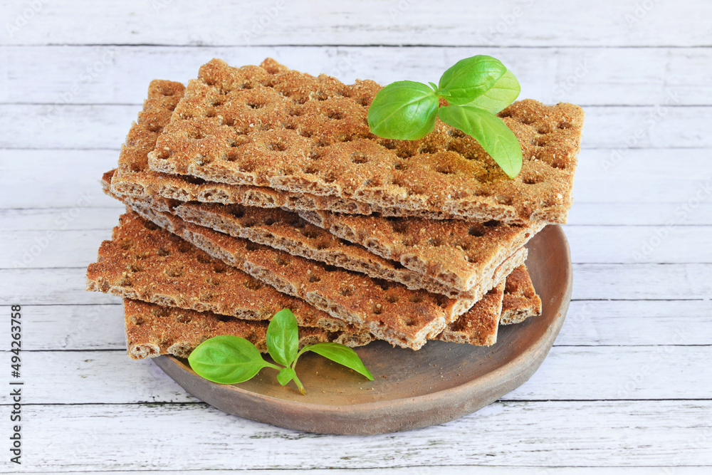 Crackers with a high fiber content, buckwheat crackers in a clay plate ...