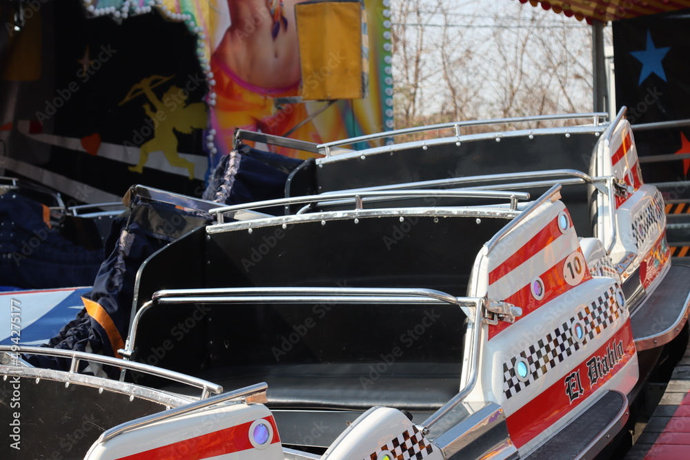 amusement park carousel with funfair seats - Stock Photo | Adobe Stock