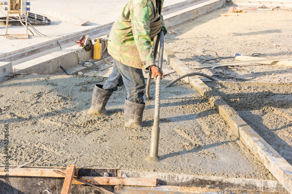 Concrete pouring during commercial concreting floors of buildings in ...