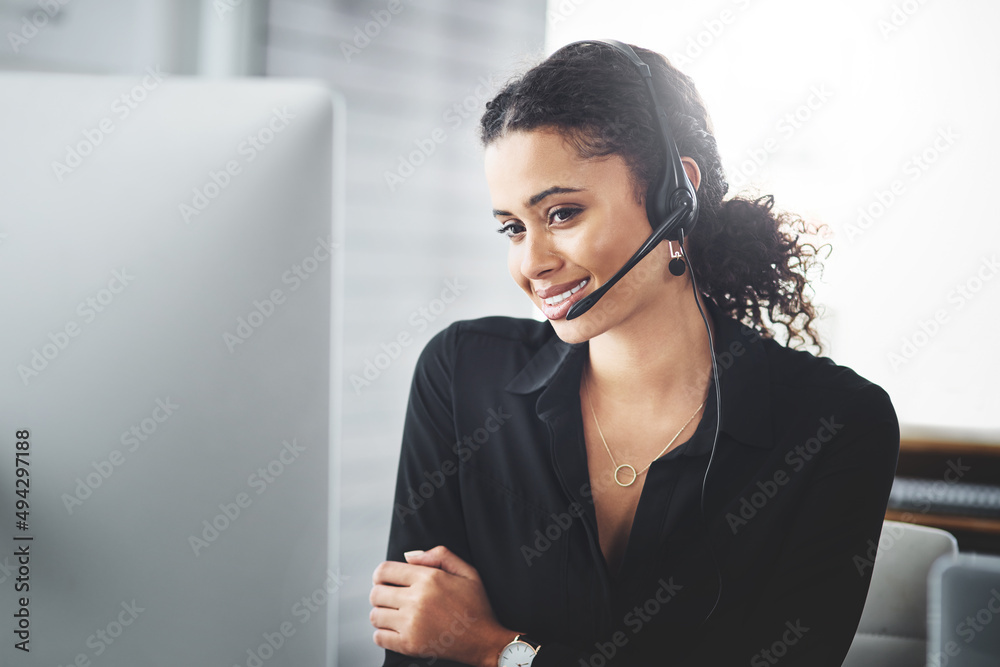 She understands what her customers need. Shot of a young call centre ...