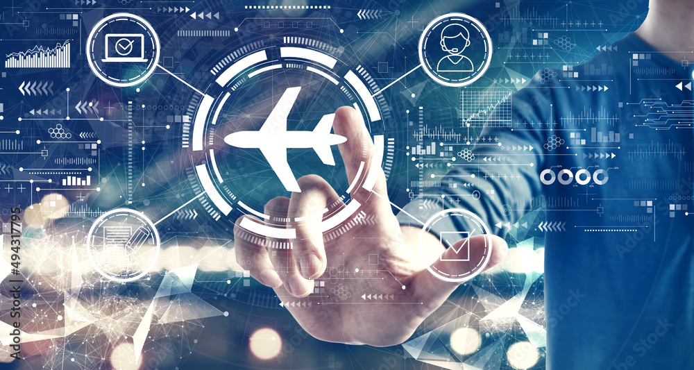 Flight ticket booking concept with a man on blurred city background ...