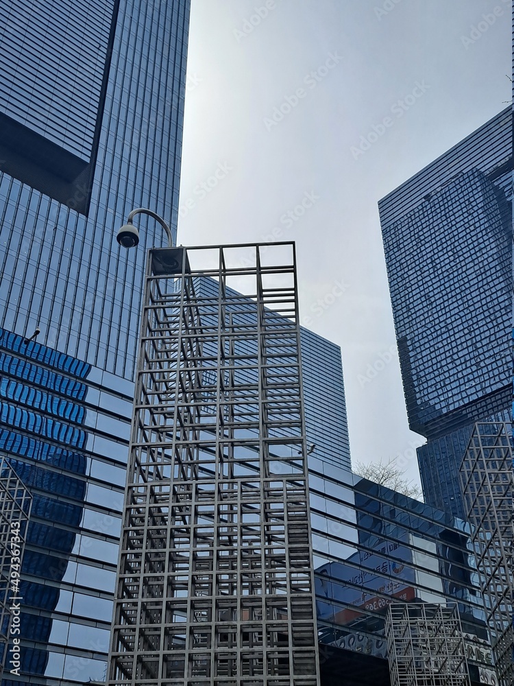 Buildings and steel tower in the harmonic shape matching in downtown ...