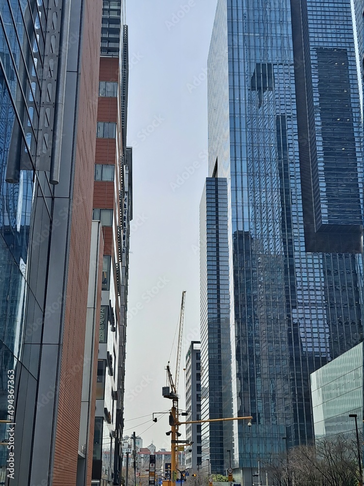 Tower crane among high rise buildings in downtown financial district ...