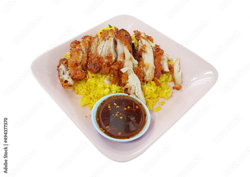 Muslim yellow rice with crispy chicken and spicy sauce Stock Photo ...