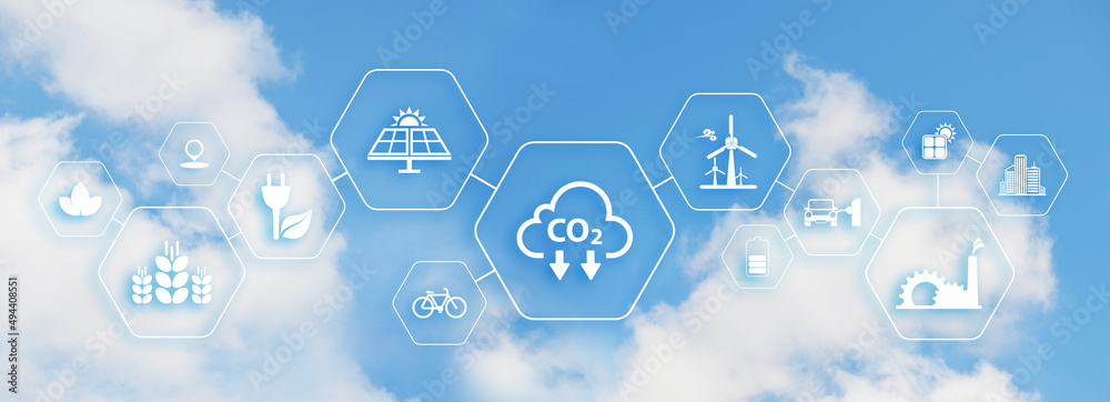 reducing CO2 emissions to stop climate change. green energy background ...