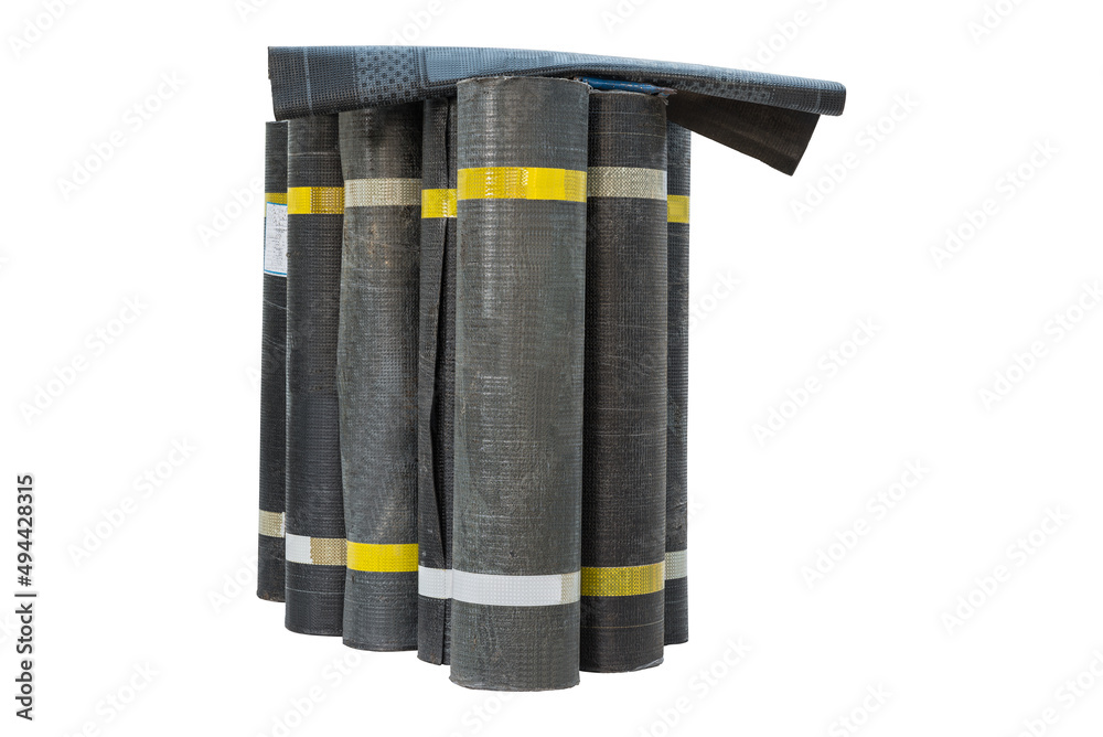 Rolls of new black roofing felt or bitumen. Group of rolls of ...