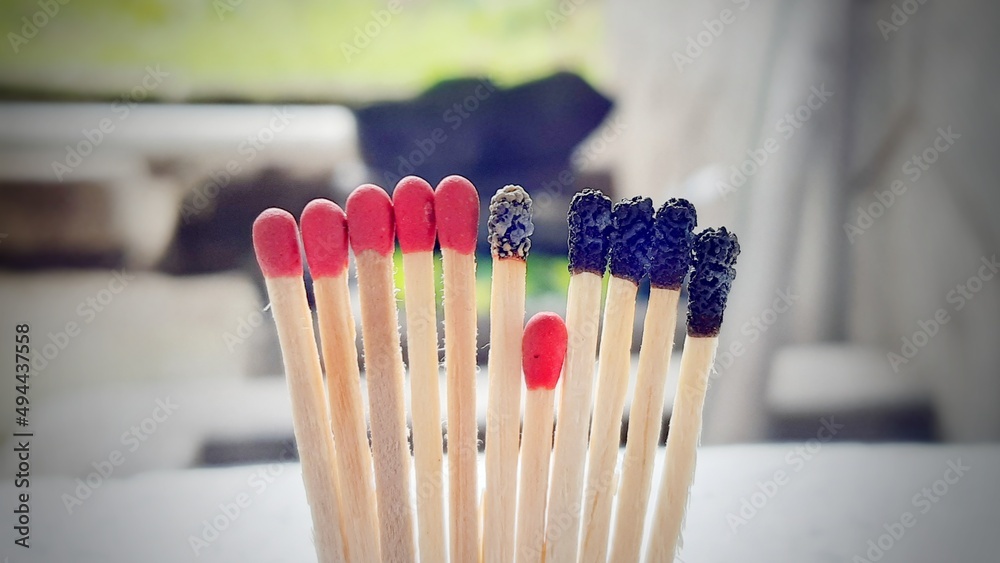 Burnt matches and whole matches on white background. The spread of fire ...