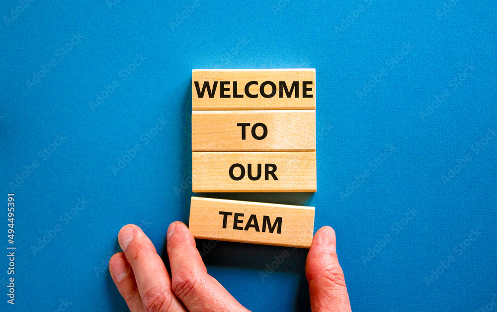 Welcome to our team symbol. Concept words Welcome to our team on wooden ...