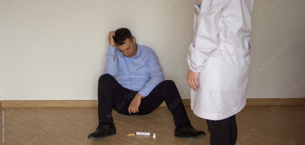 Female doctor giving help to a patient after abusing drugs. Problems ...