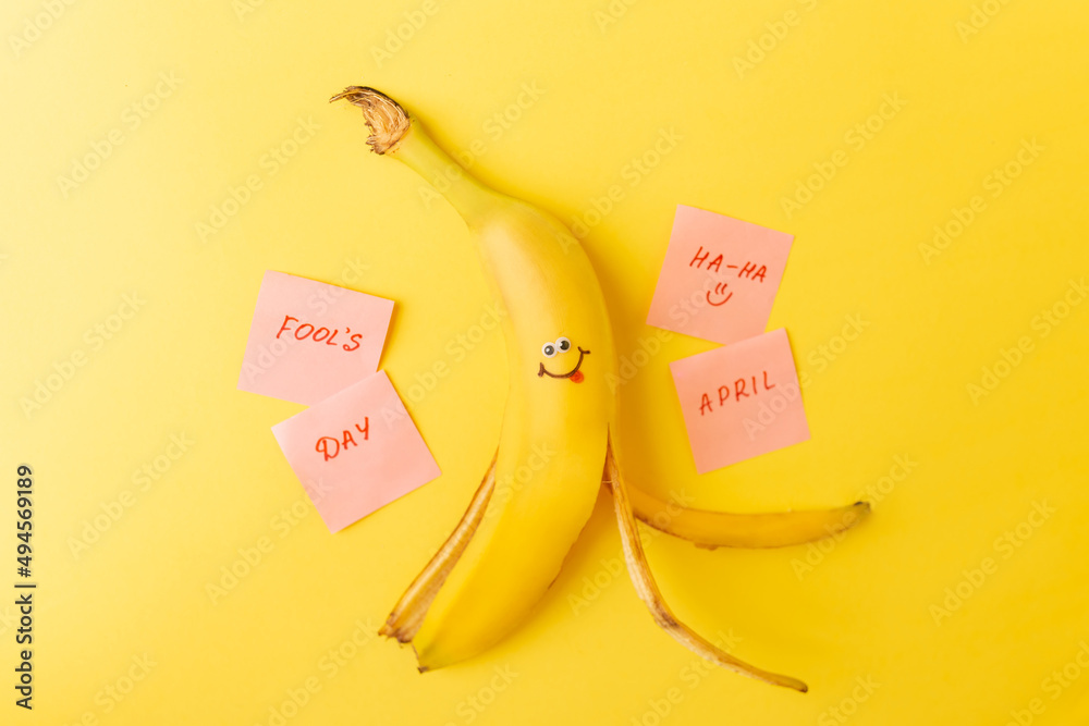 Banana peel with words Fool's Day on the yellow background. April 1st ...