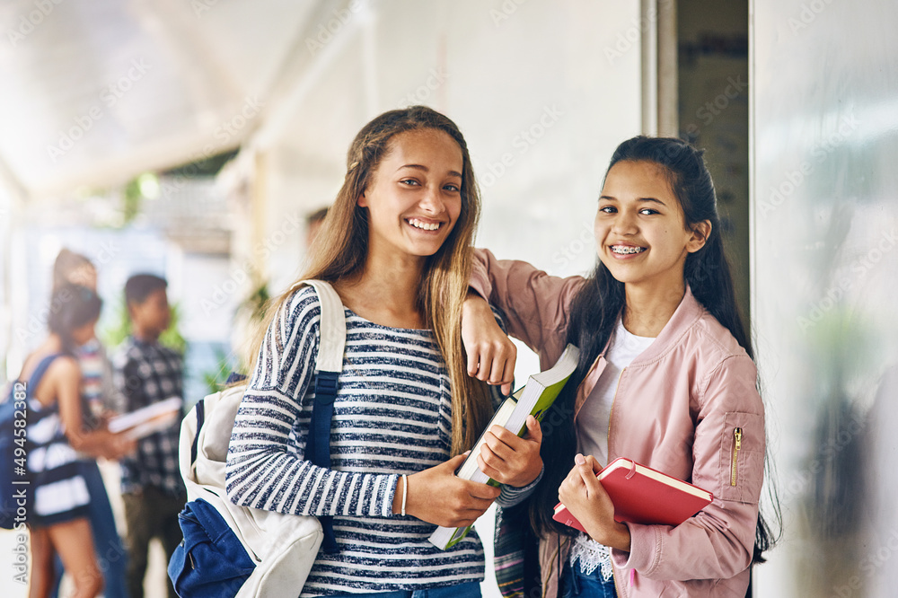 Best friends and study buddies. Portrait of two happy schoolgirls ...