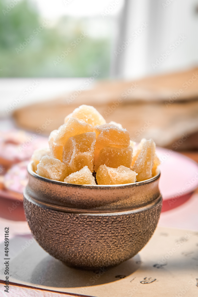 candies dried caramelized ginger cube candies in a bowl, healthy eating ...