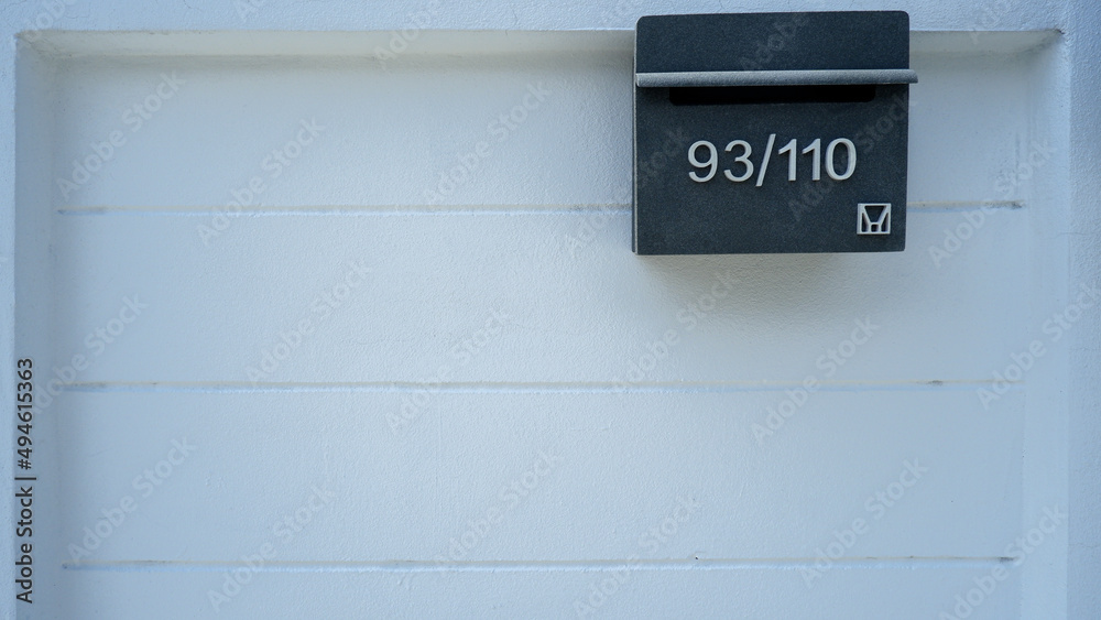 Square white wall background with numbered sign. Stock Photo | Adobe Stock