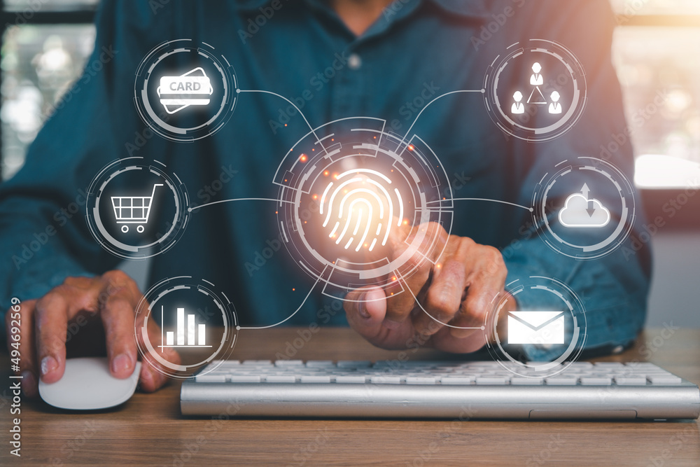 Business person hand using fingerprint indentification to access ...