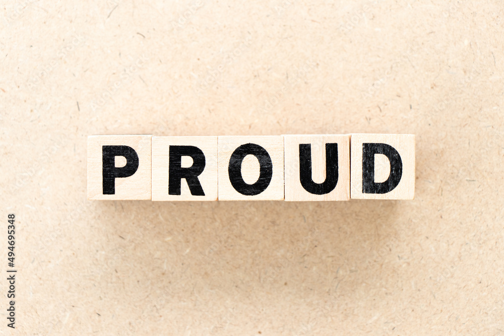 Alphabet letter block in word proud on wood background Stock Photo ...
