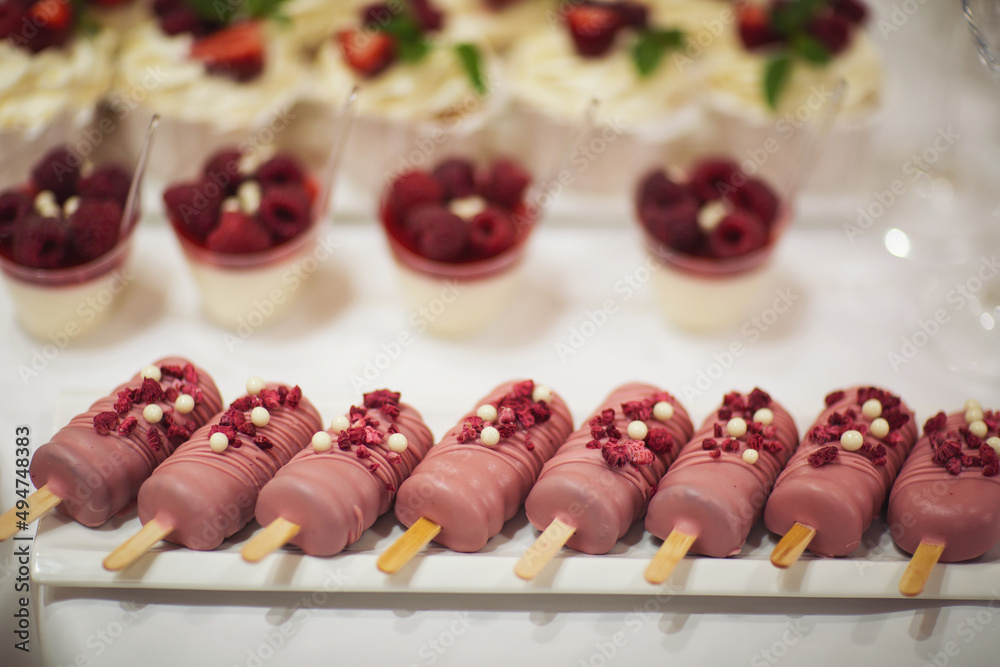 Delicious dessert of cake with fresh strawberries, raspberries and mint ...