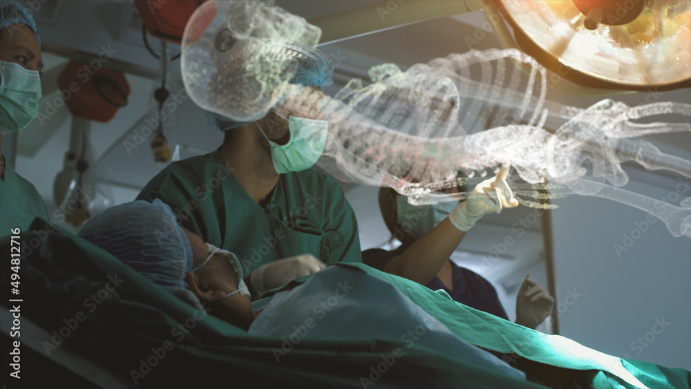 Futuristic operating room simulation - a surgeon diagnosing a senior ...