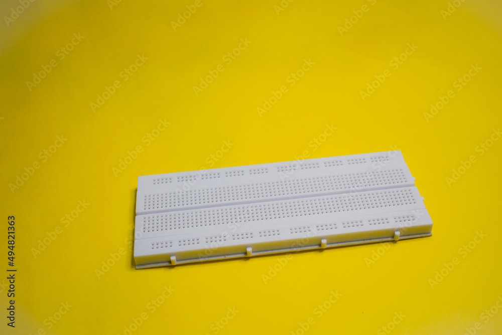 electronic breadboard for experiments isolated on a plain background ...