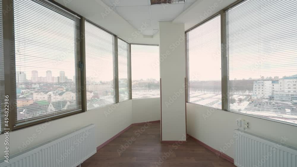 Inside a skyscraper, the interior of an empty office space with ...