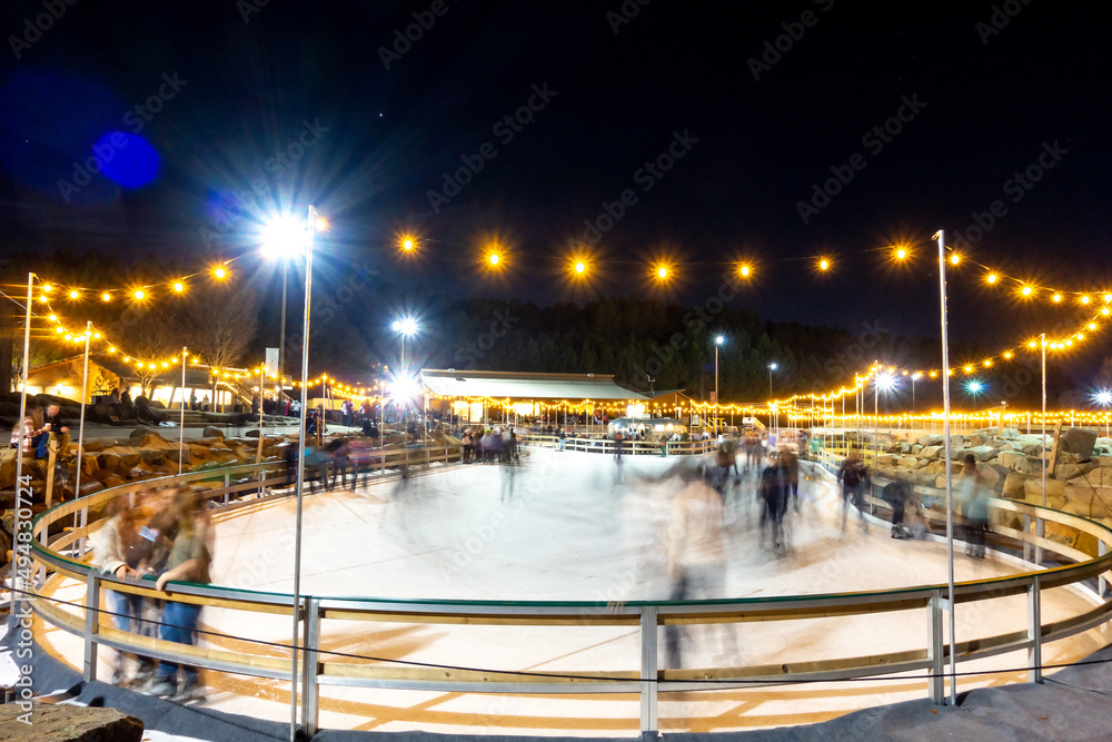 beautiful outdoor ice rink at night with lights Stock Photo | Adobe Stock