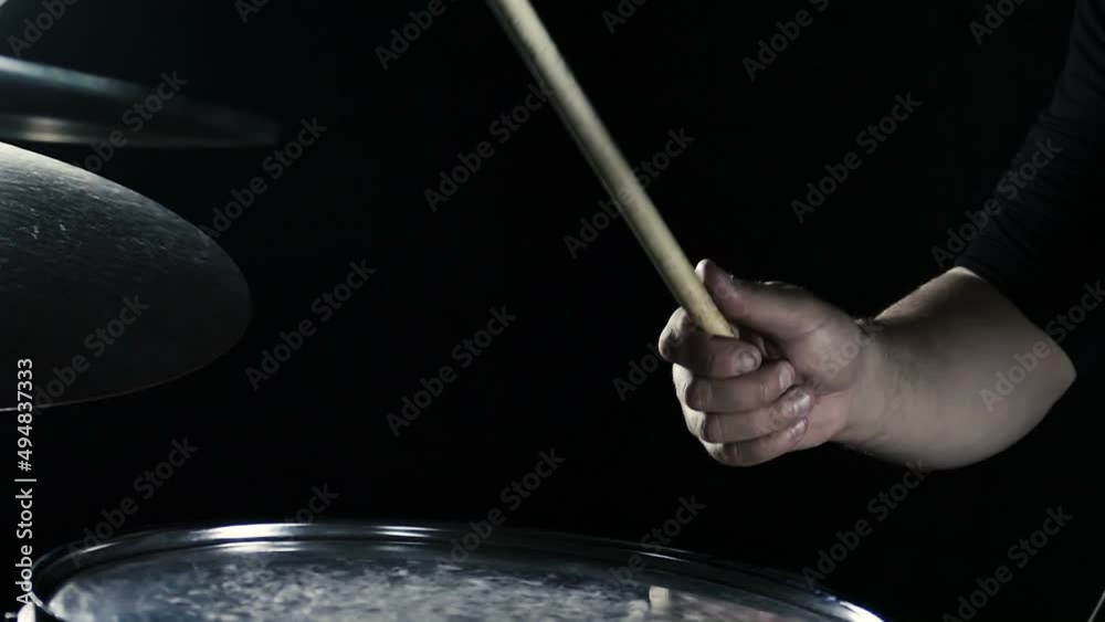 Close-up Man Hands Hitting Drum Set on Black Background, Slow Motion. A ...
