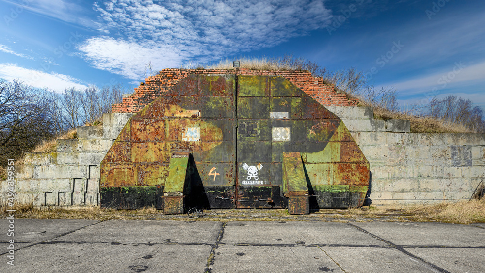 Bunkers and planes on an old Russian airfield Stock Photo | Adobe Stock