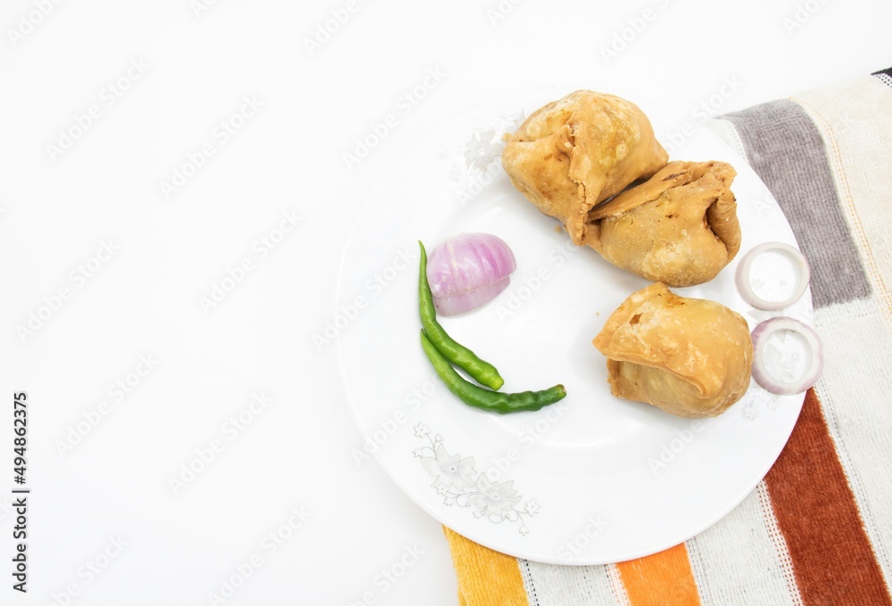 deep fried Singara made by potato and maida isolate on white background ...