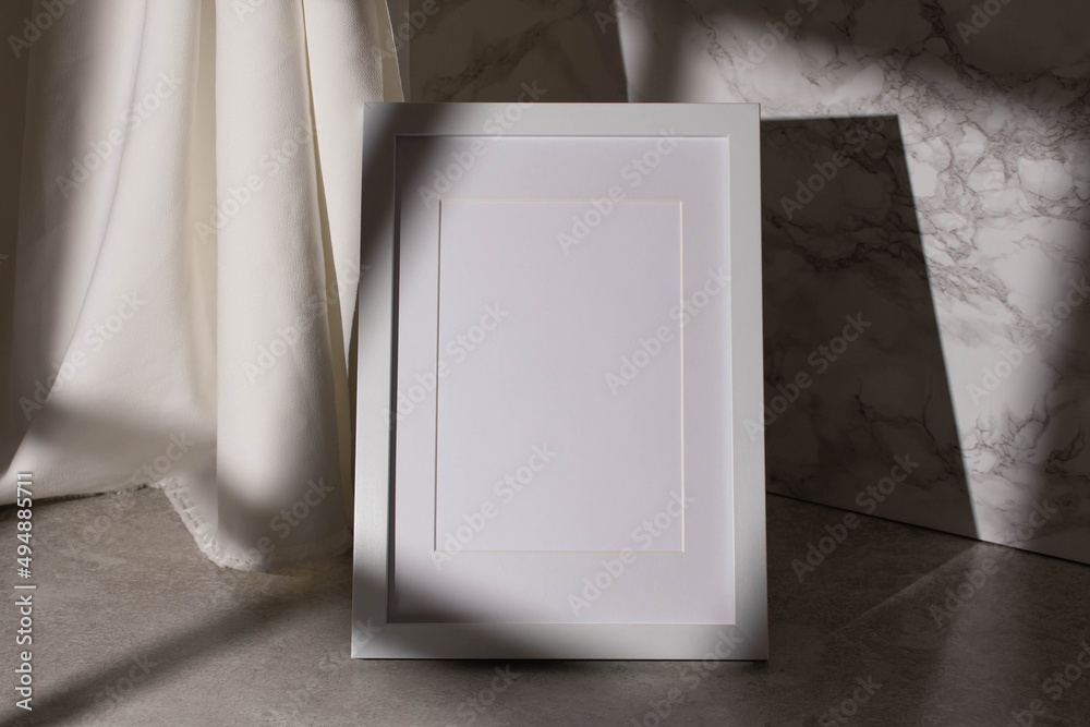Blank empty mock up art paper picture frame sheet on marble granite ...