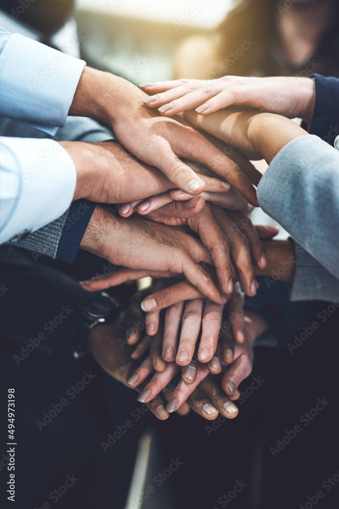 We work best when we collaborate together. Closeup shot of a group of ...