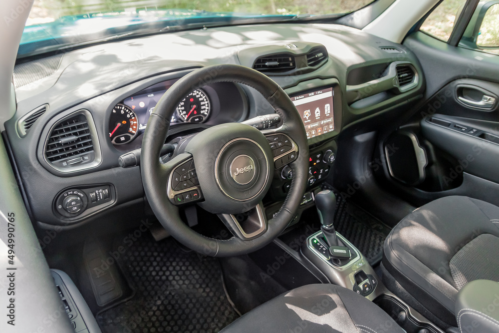 Jeep Renegade SUV 4x4 interior view cockpit, steering wheel and buttons ...