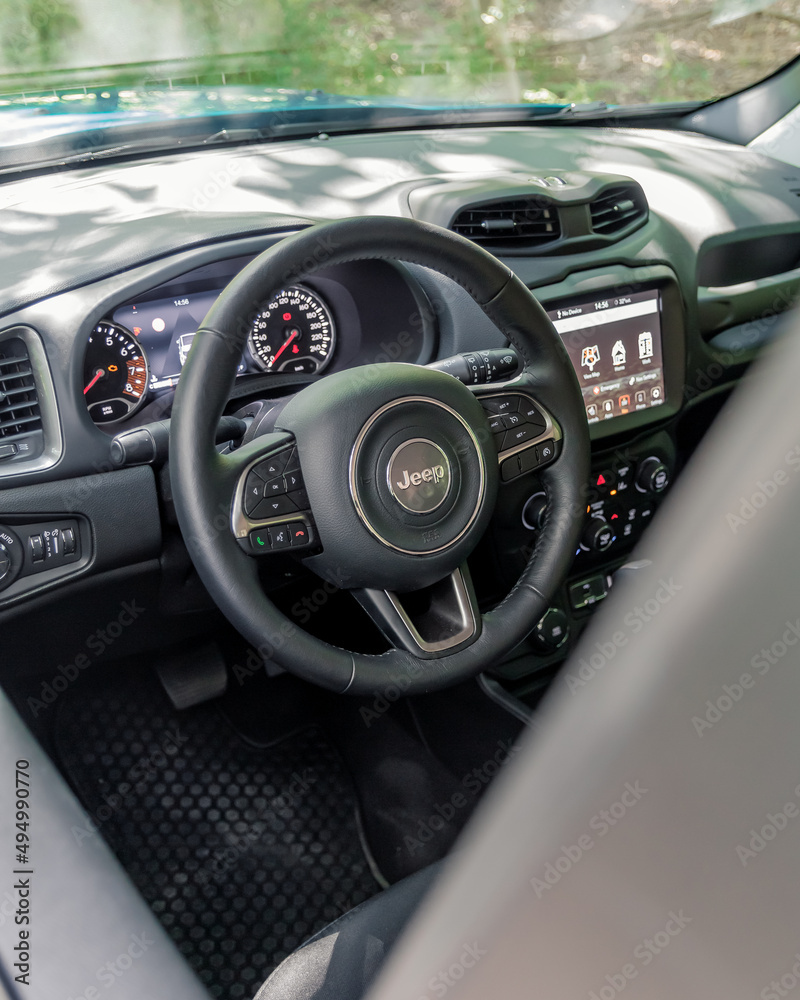 Jeep Renegade SUV 4x4 interior view cockpit, steering wheel and buttons ...