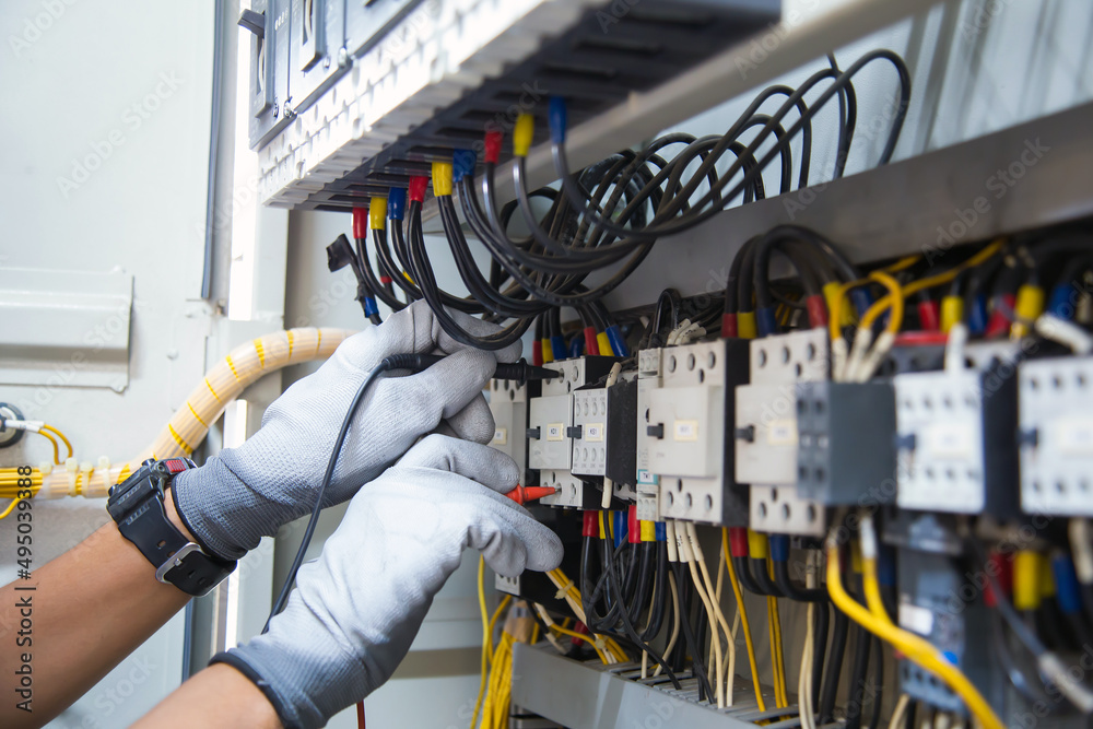Electricity and electrical maintenance service, Engineer using ...