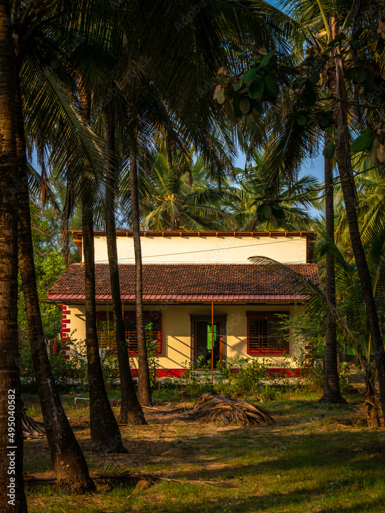 Indian house with traditional roof design at coastal side of ...