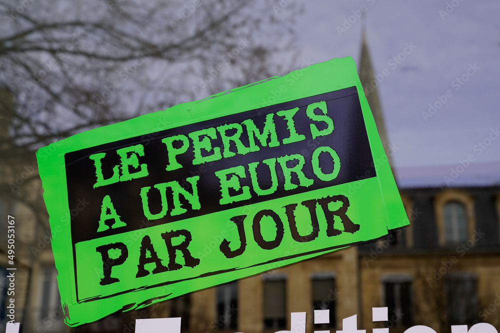 permis de conduire a un euro par jour logo text and sign on windows ...