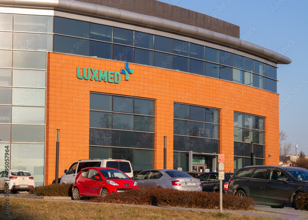 Luxmed medical care logo sign on company building. Lux Med Group ...
