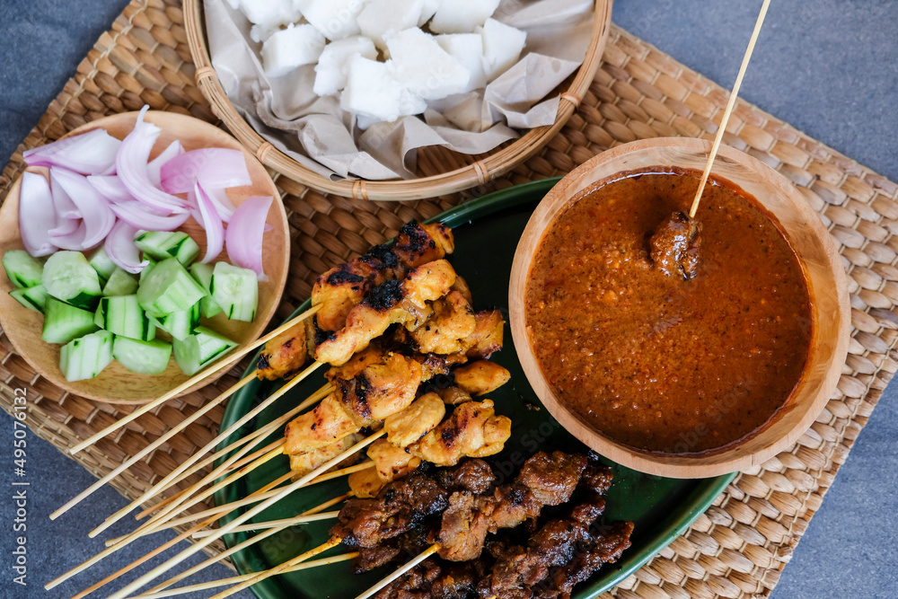 Traditional Muslim street food. Satay Chicken and Mutton with Spicy ...