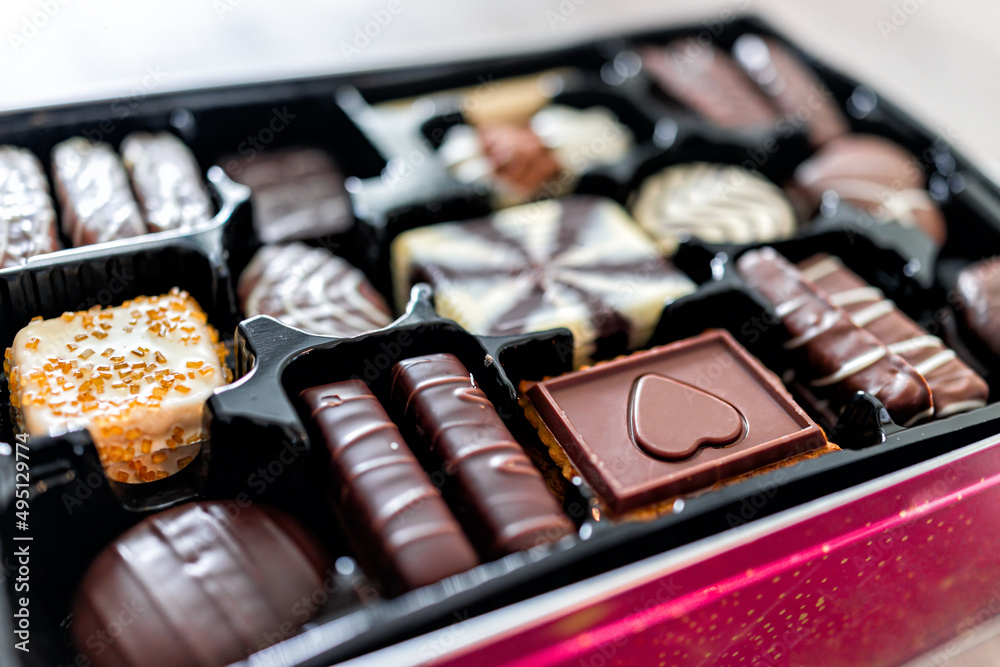 European chocolate cookies box side view closeup with truffles gourmet ...