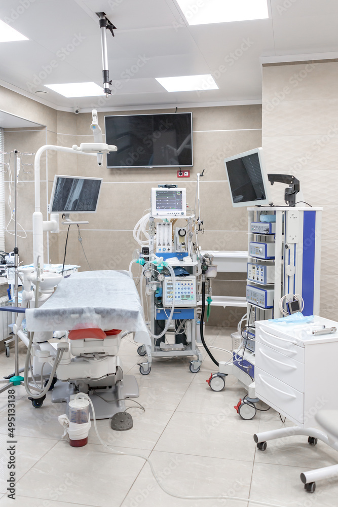 Patient monitor with vital signs in operating room with medical ...