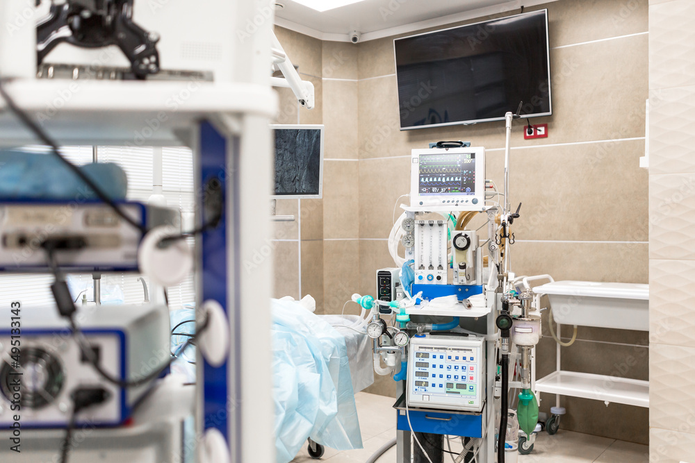Patient monitor with vital signs in operating room with medical ...