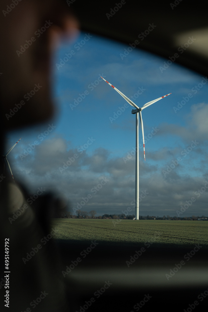 visible wind farms from the car window - environmental awareness Stock ...