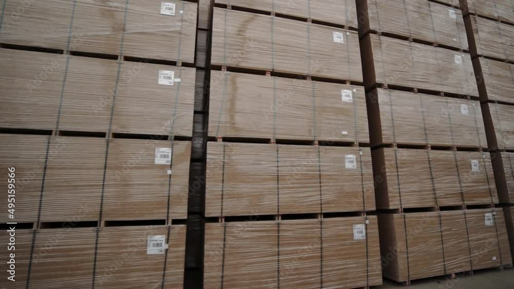 Stack of full size OSB chipboard pallets, ready to pick up by forklift ...