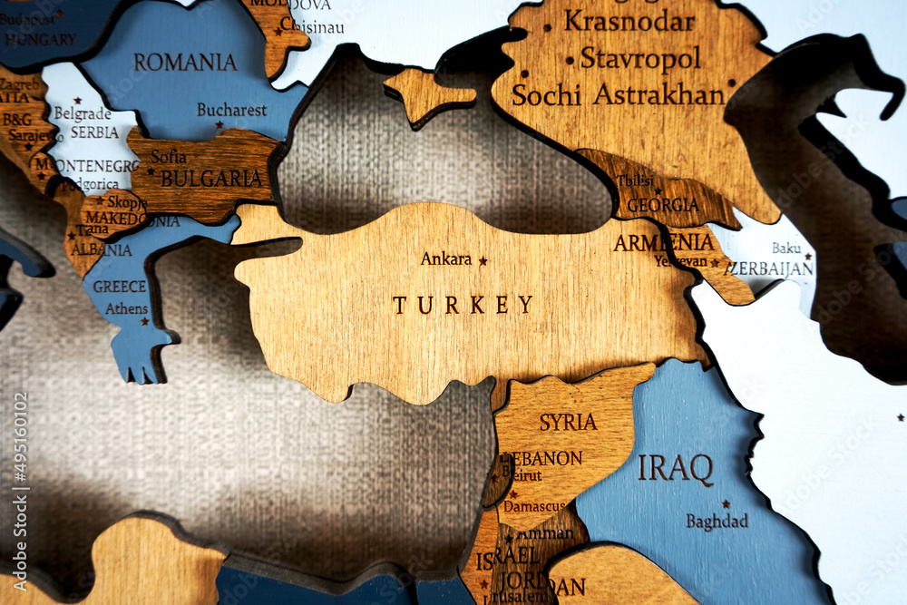 Turkey on a wooden world political map on a wall. Stock Photo | Adobe Stock