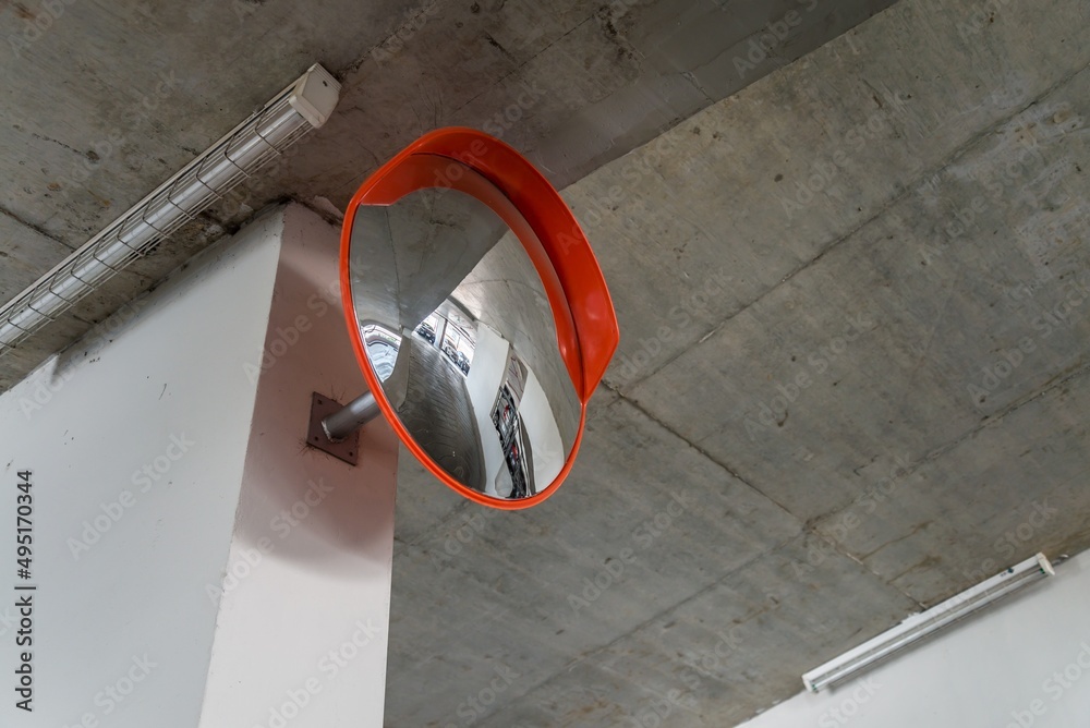 Indoor traffic surveillance convex mirror in building car parking area ...